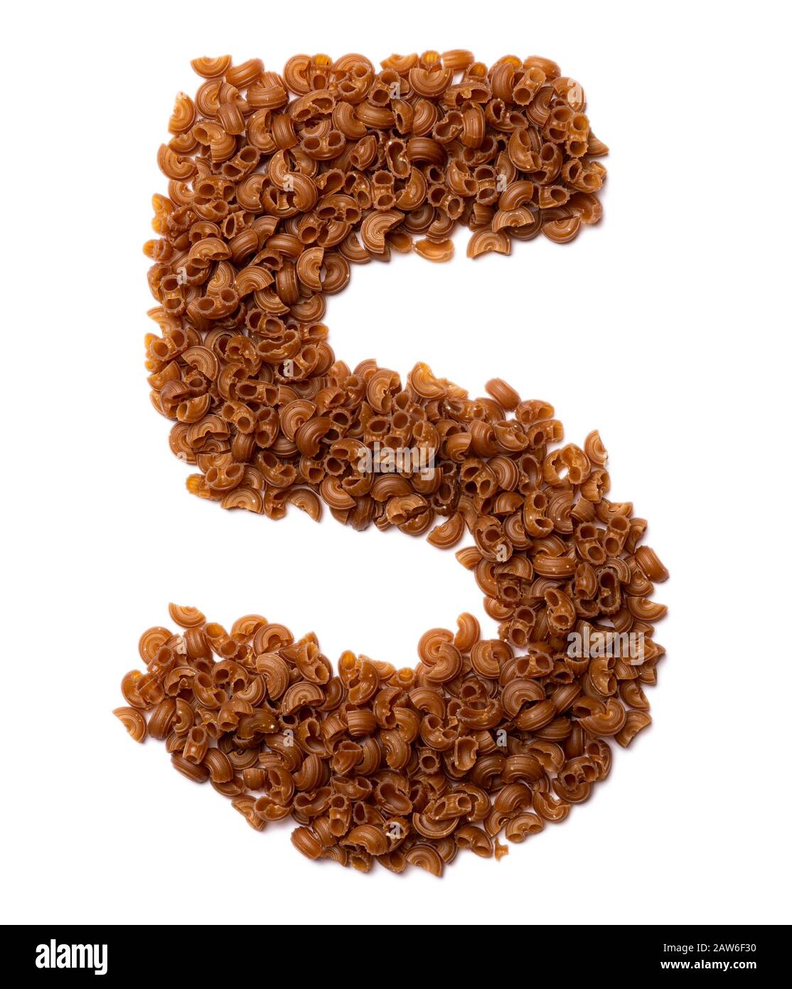 Arabic numeral "5" from dry pasta from buckwheat amaranth flour on a ...