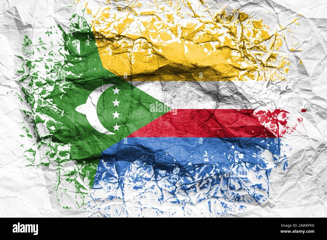 The national flag of the Comoros is painted on crumpled paper. Flag ...