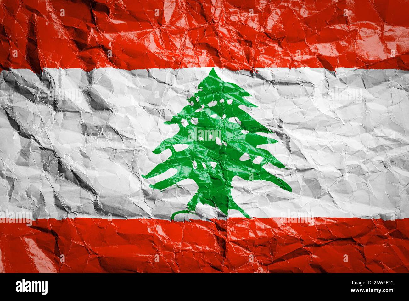 National flag of Lebanon on crumpled paper. Flag printed on a sheet ...