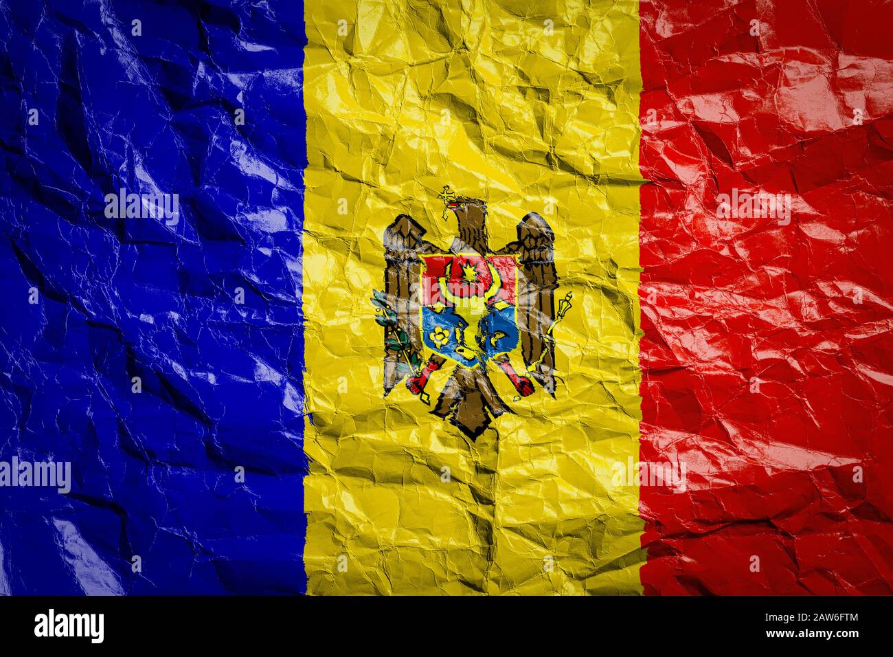 National flag of Moldova on crumpled paper. Flag printed on a sheet ...