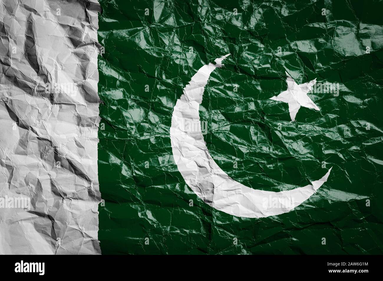 National flag of Pakistan on crumpled paper. Flag printed on a sheet ...