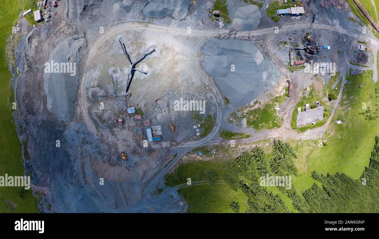 Aerial view of a small plant for the production and cleaning rubble and ...