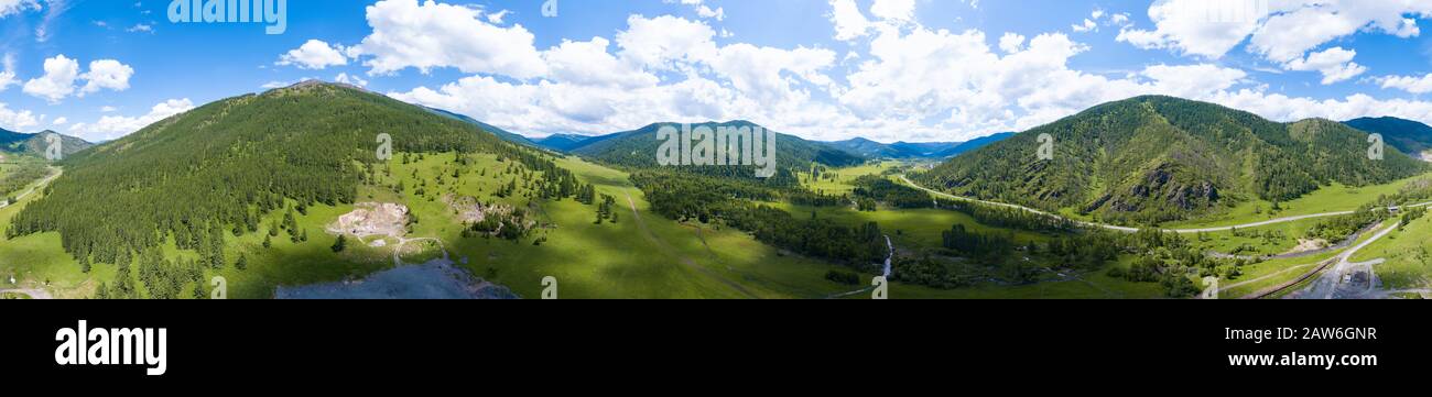 Aerial panoramic banner view of landscape with mountains, green trees ...