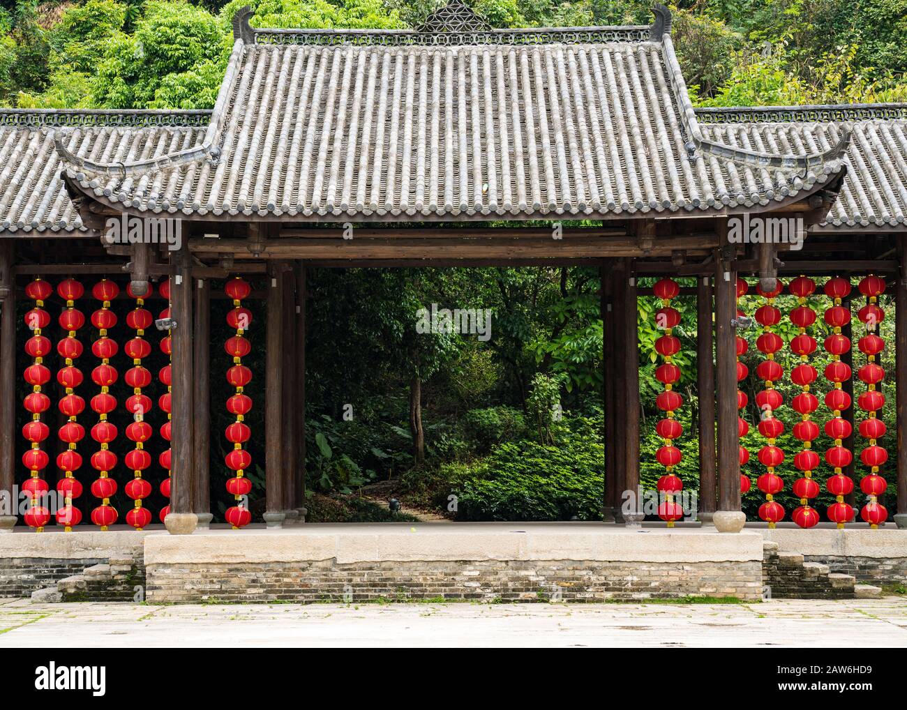 The old wooden building with red lanterns on both side Stock Photo - Alamy