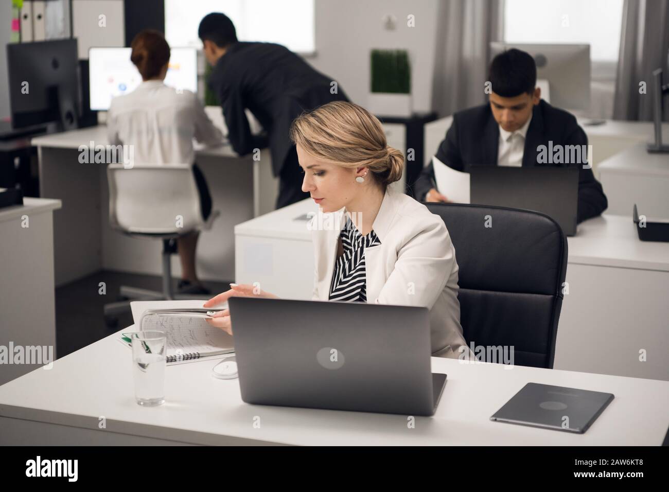 Office worker woman looks through hi-res stock photography and images ...