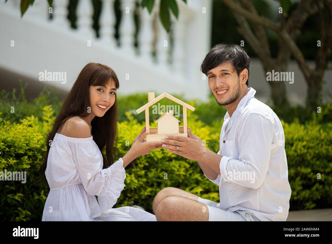 Happy Romantic Couples lover talking and drinking wine while having a ...