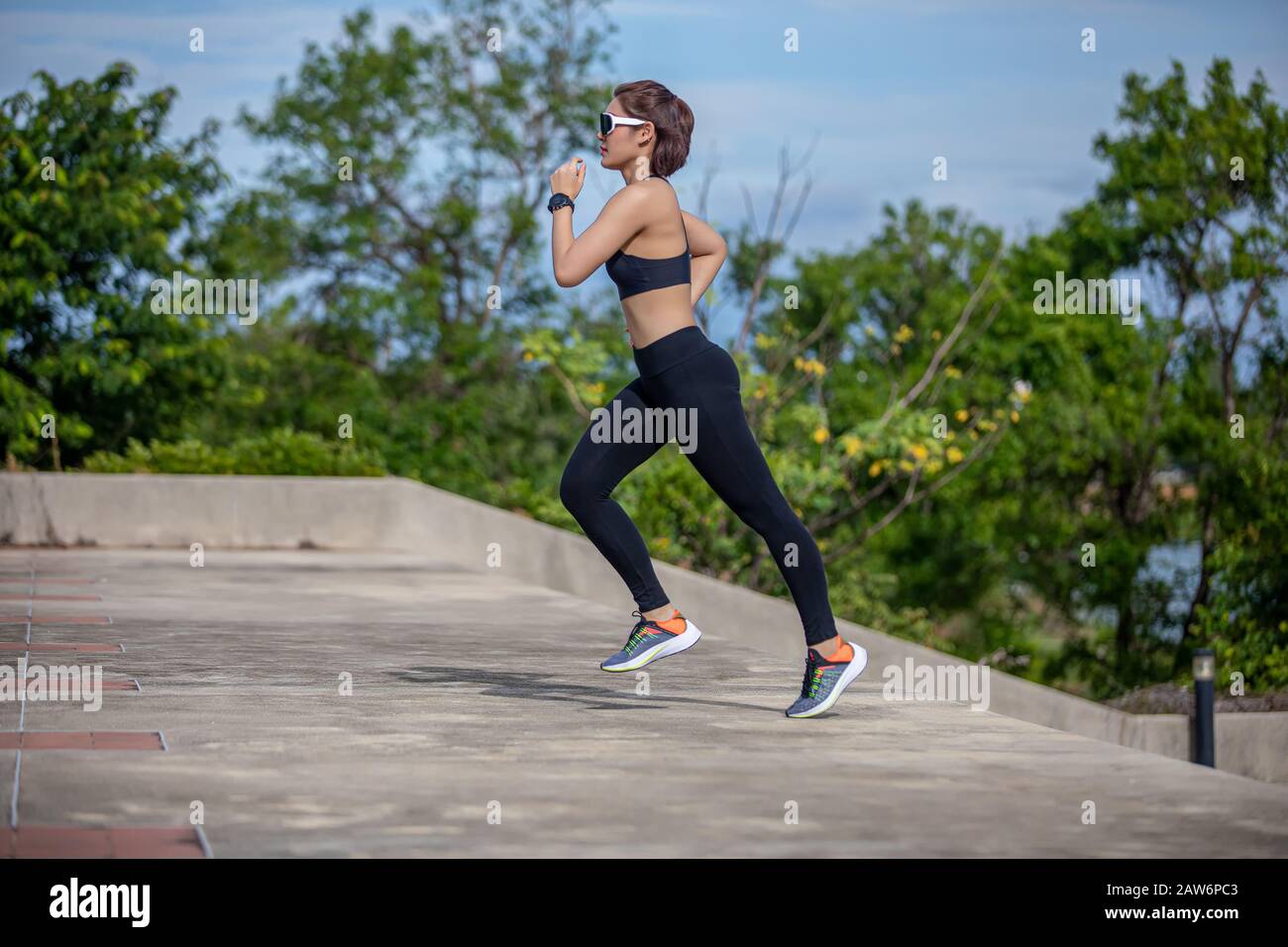 Asian women Running and jogging during outdoor on city run Stock Photo ...