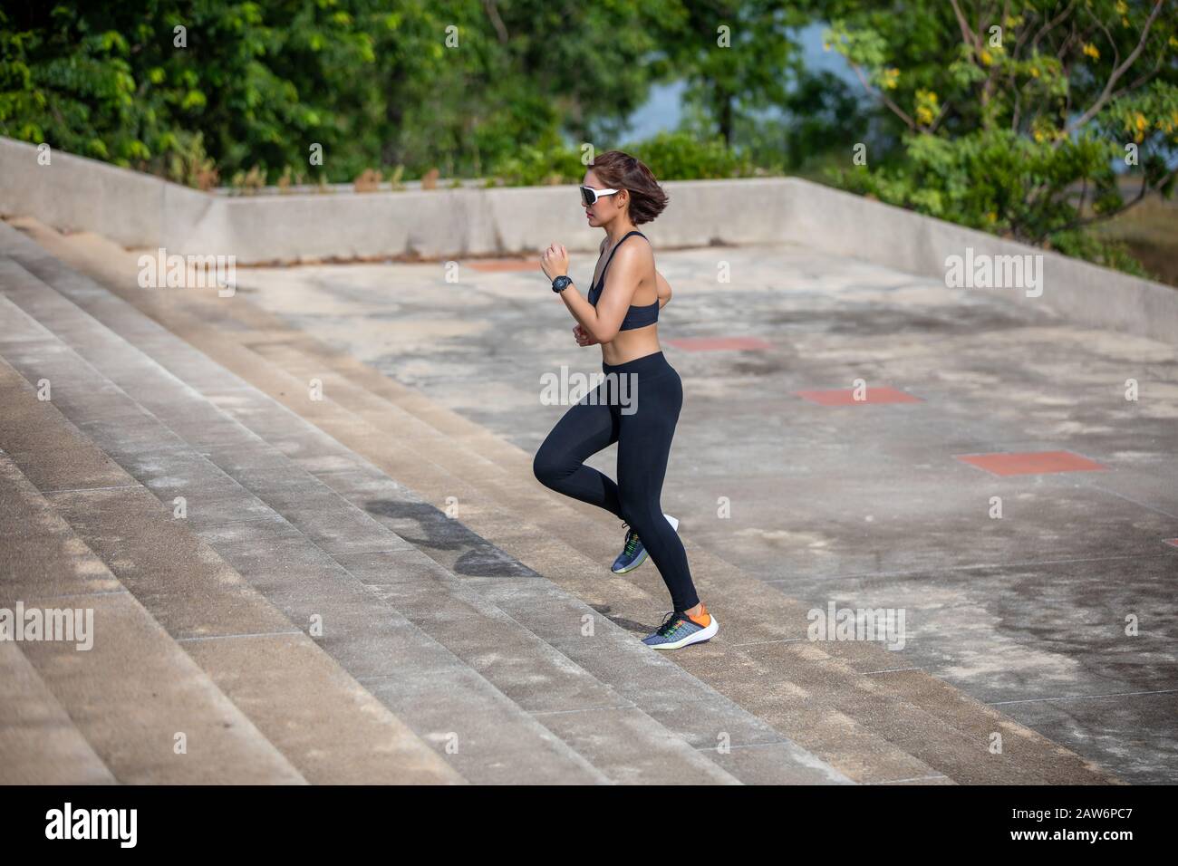 Asian women Running and jogging during outdoor on city run Stock Photo ...