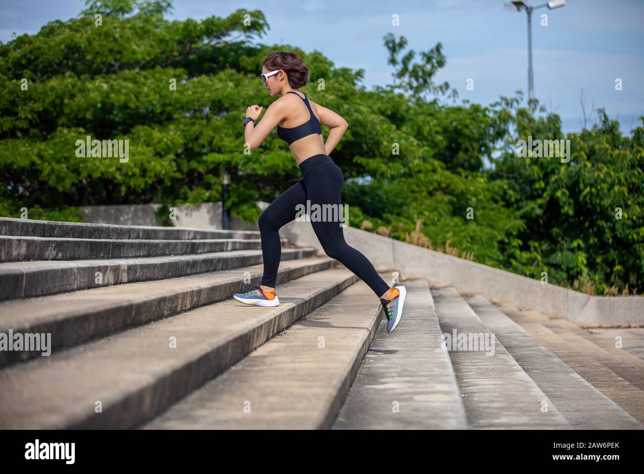 Asian women Running and jogging during outdoor on city run Stock Photo ...
