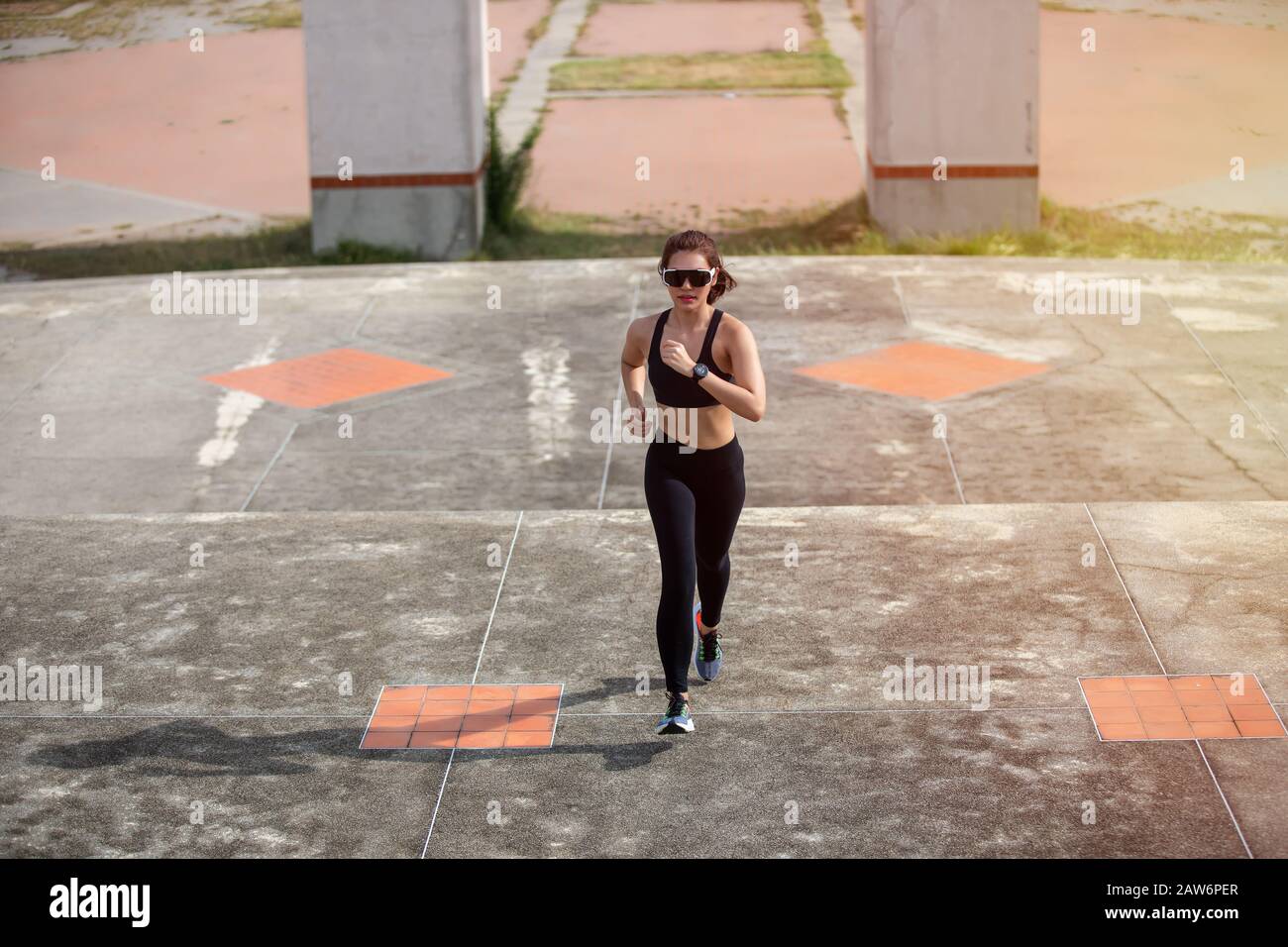 Asian women Running and jogging during outdoor on city run Stock Photo ...