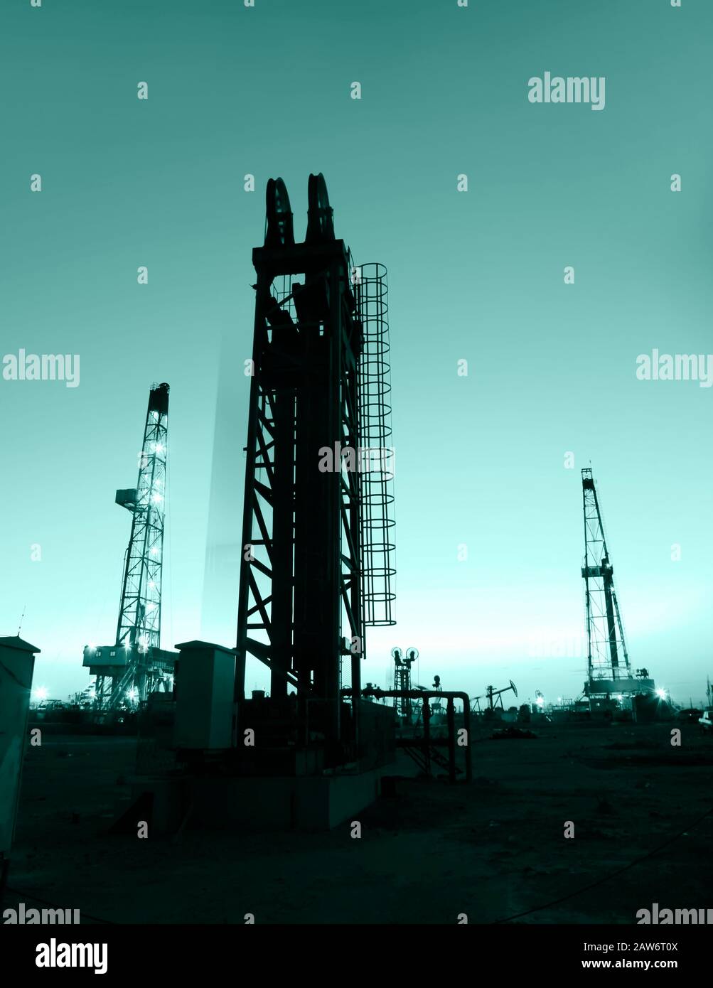 Tower type pumping unit in the evening Stock Photo - Alamy
