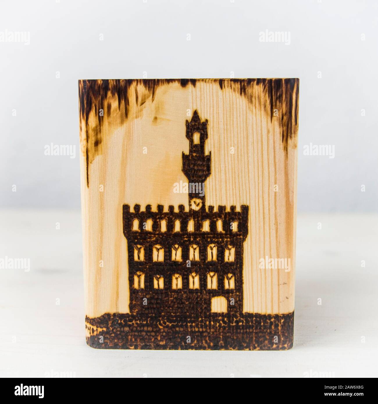 the ancient art of pyrography, wood and fire, the symbols of the city ...
