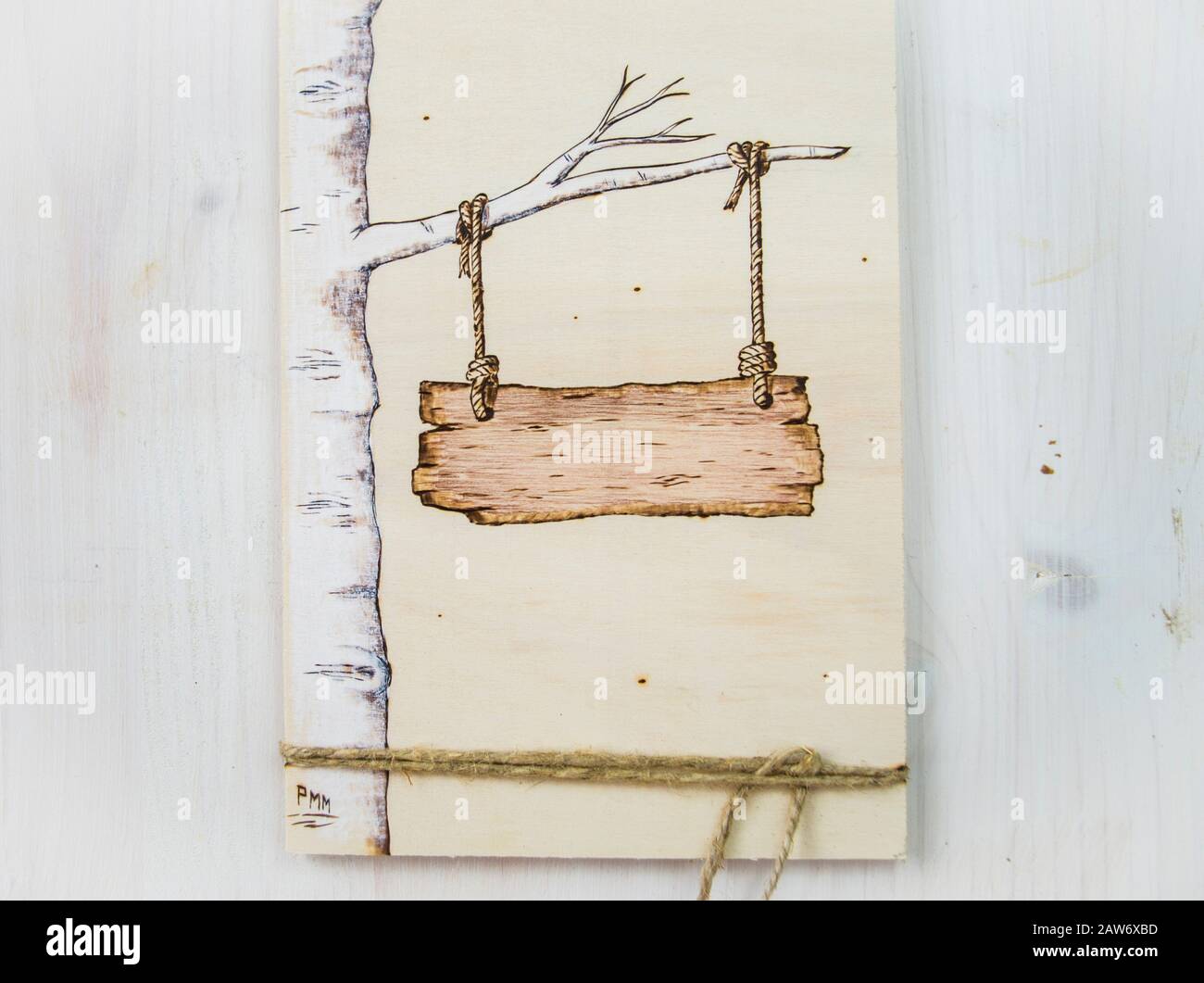 the ancient art of pyrography, wood and fire, with a sign to write your ...