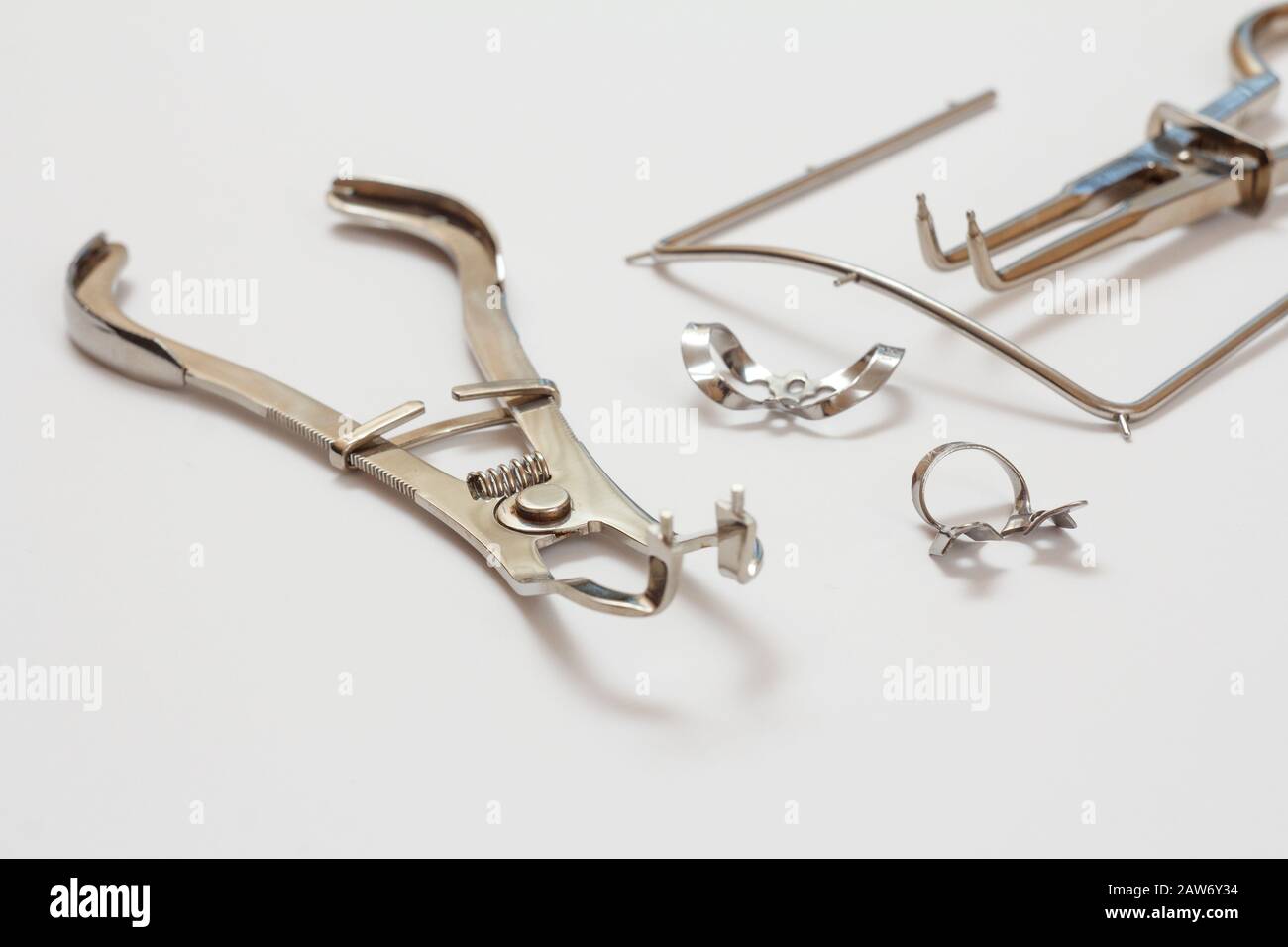 Metal instrument for dental treatment. Dental tongs, clasps and ...