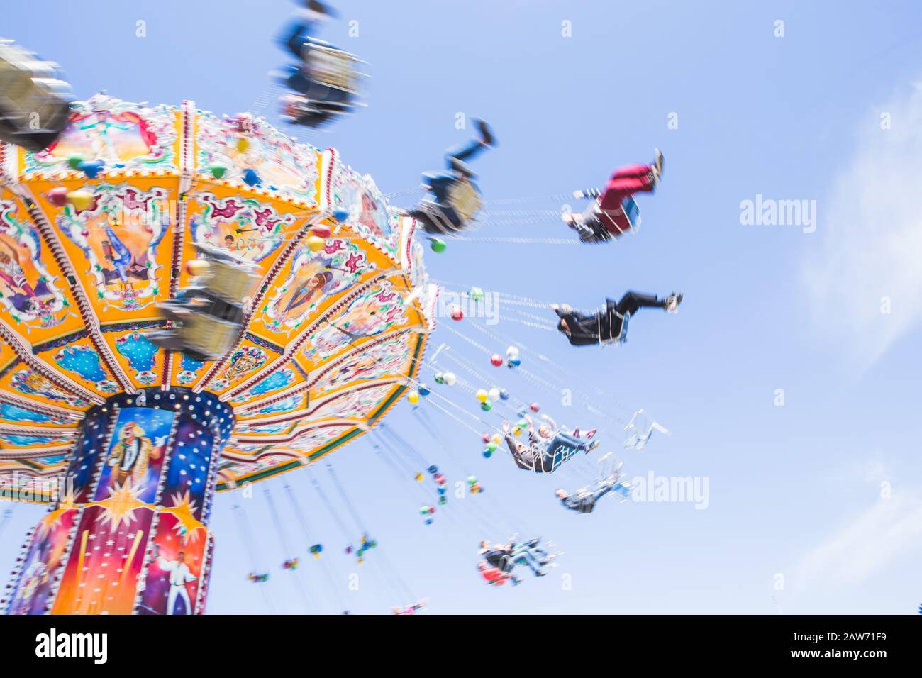 Chain carousel ride in an amusement parks carnivals or funfair, Munich ...