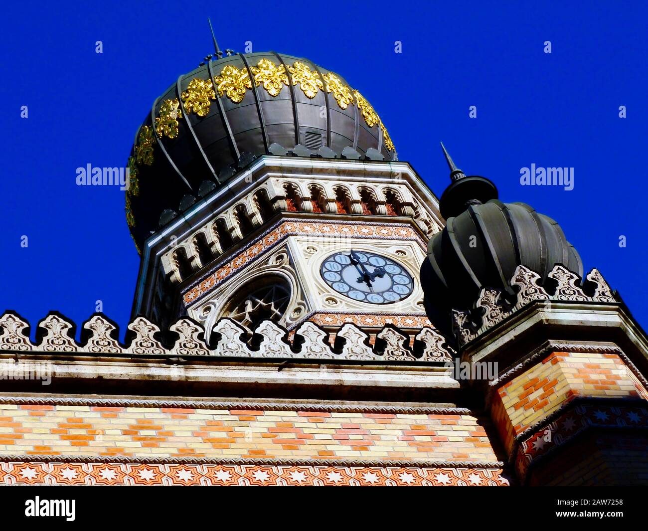 synagogue clock tower in Budapest. Moorish style brick tower. onion ...