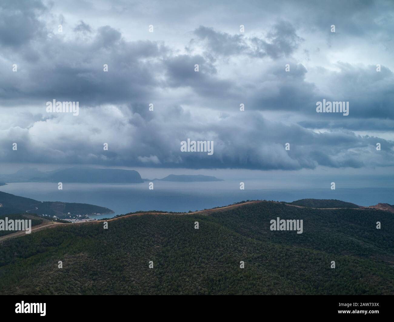 Dark clouds swirl above hi-res stock photography and images - Alamy