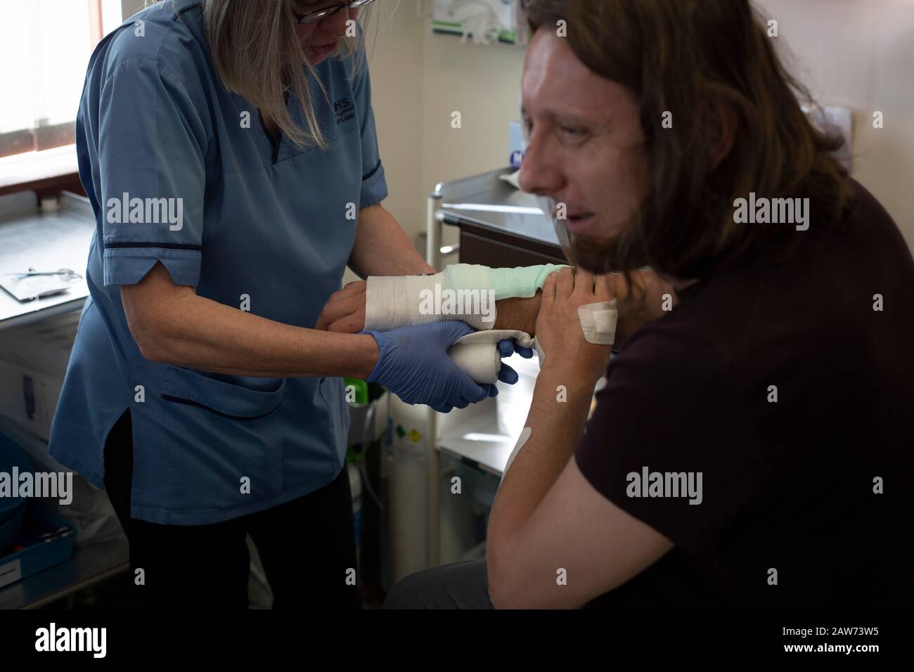 Nurse Beverley Reid treating Radek Polach at the medical practice on ...
