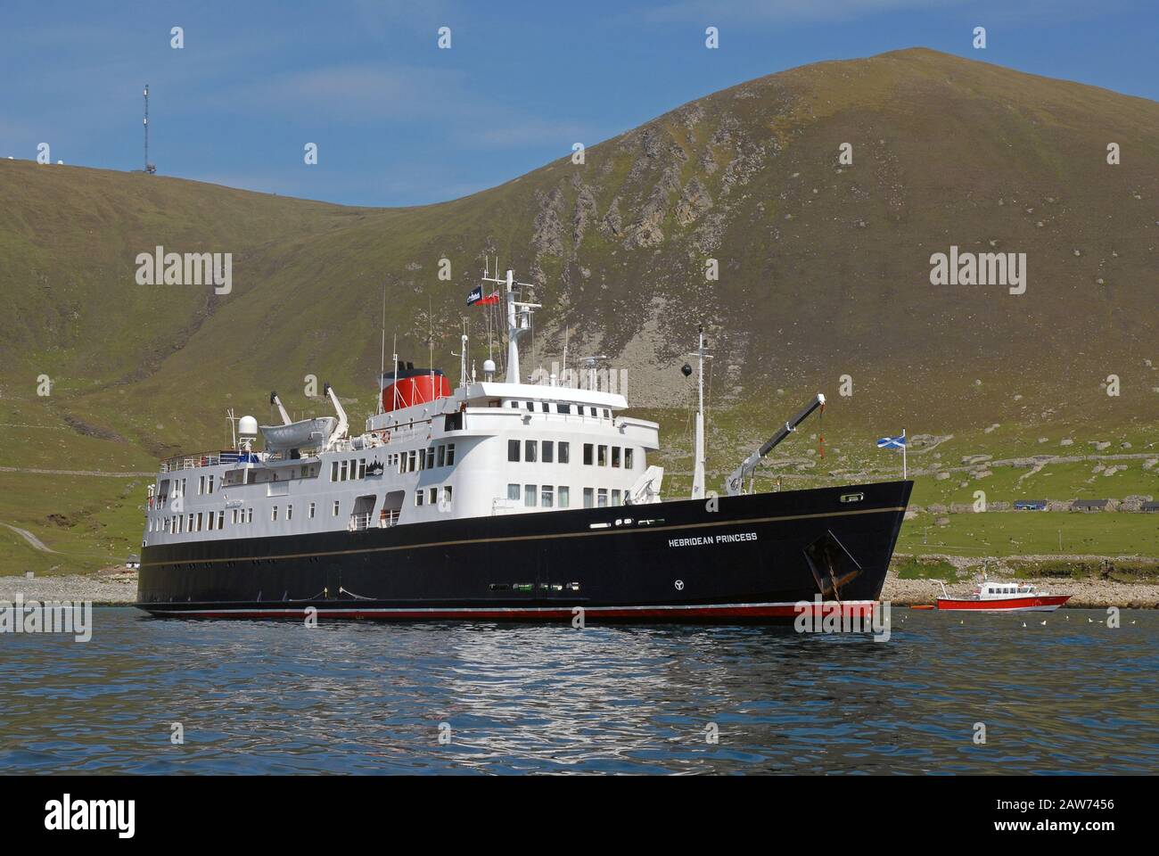 HEBRIDEAN PRINCESS at anchor underneath the highest point of the island ...