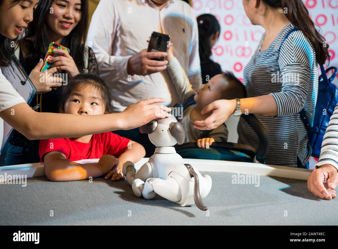 Shenzhen, China, April, 2019. AIBO robot on display at Sony Expo 2019. AIBO (stylized aibo ...
