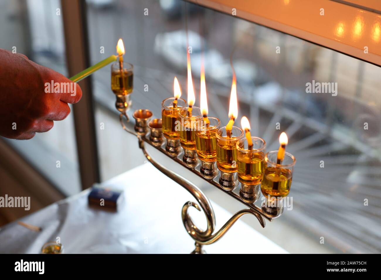 Jewish menorah lighting hanukkah candles hi-res stock photography and ...