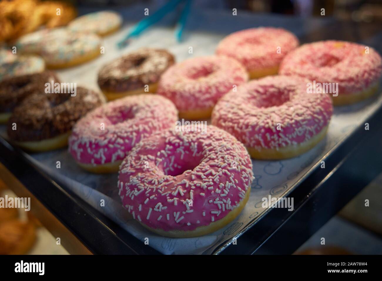 Various colored delicious donuts hi-res stock photography and images ...