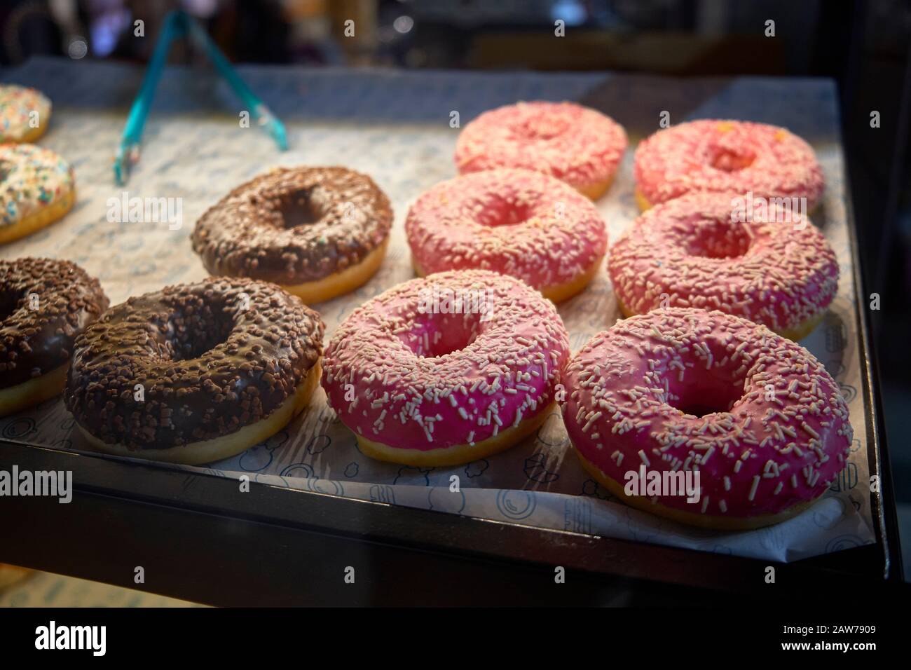 Various colored delicious donuts hi-res stock photography and images ...