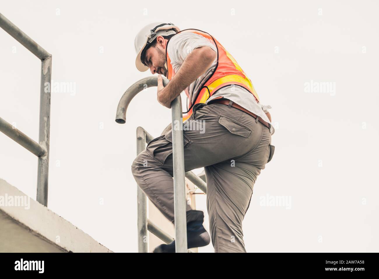 Man male ladder climb fix repair maintenance hi-res stock photography ...