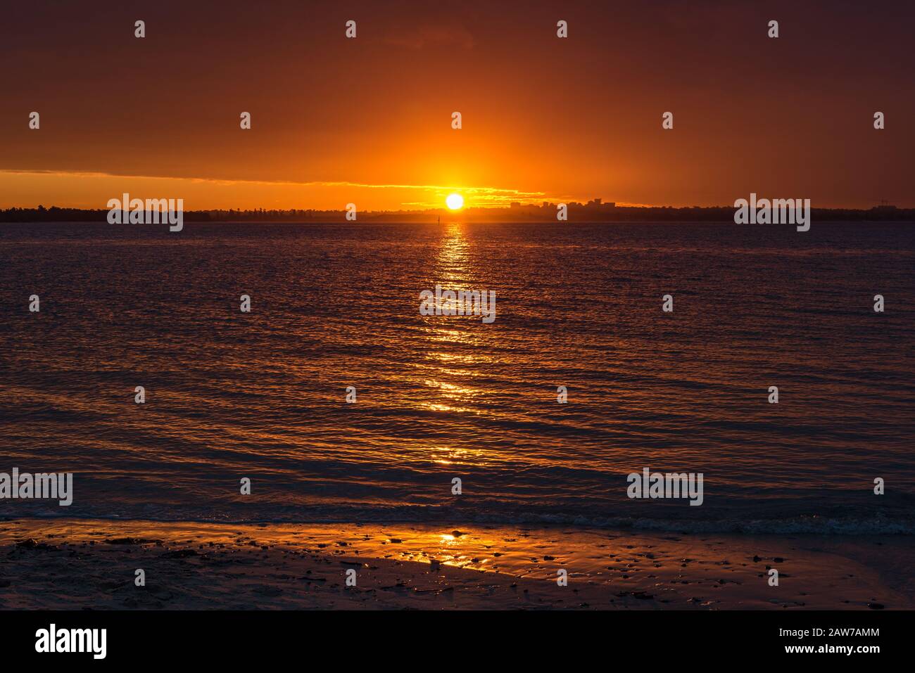 Bright orange red sunset sky over water. Nature background Stock Photo ...