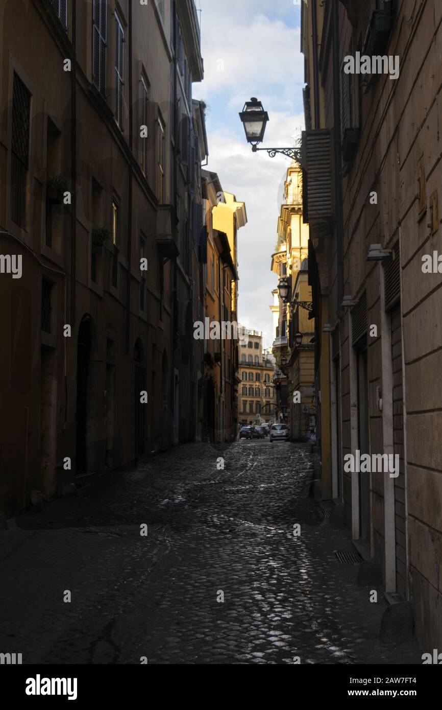 narrow alley in Rome historic center Stock Photo - Alamy