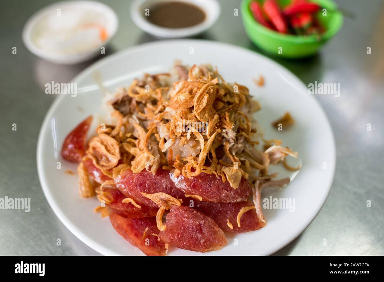 Close up of traditional Vietnamese cuisine of fried rice with wurst ...