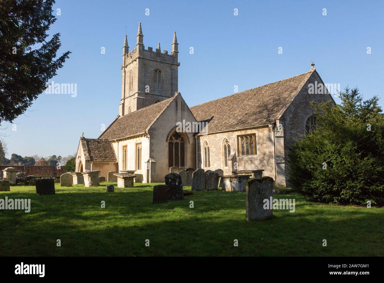 Graves in the graveyard of the village parish church of Saint James the ...