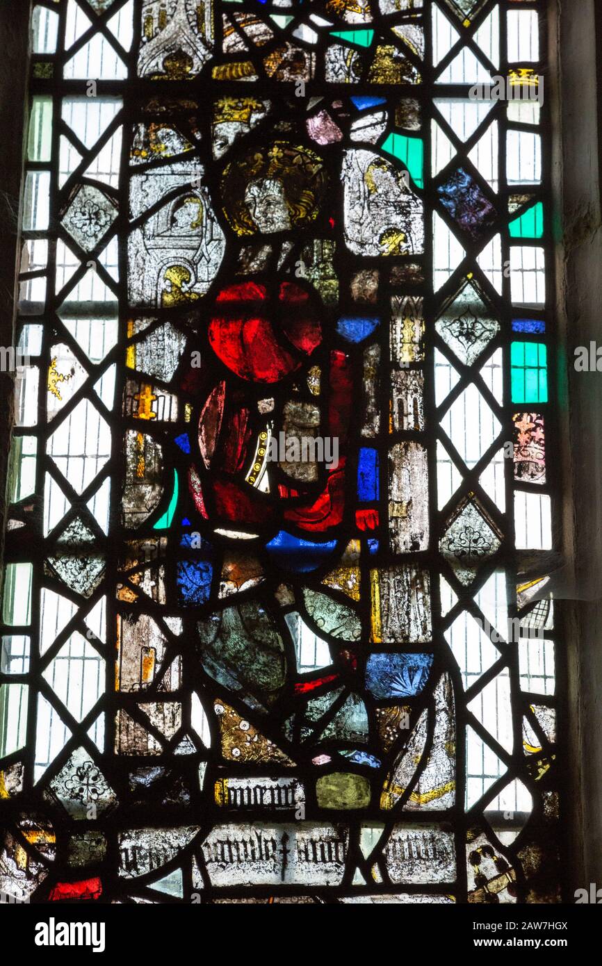 Fragments of medieval stained glass including faces of saints used to ...