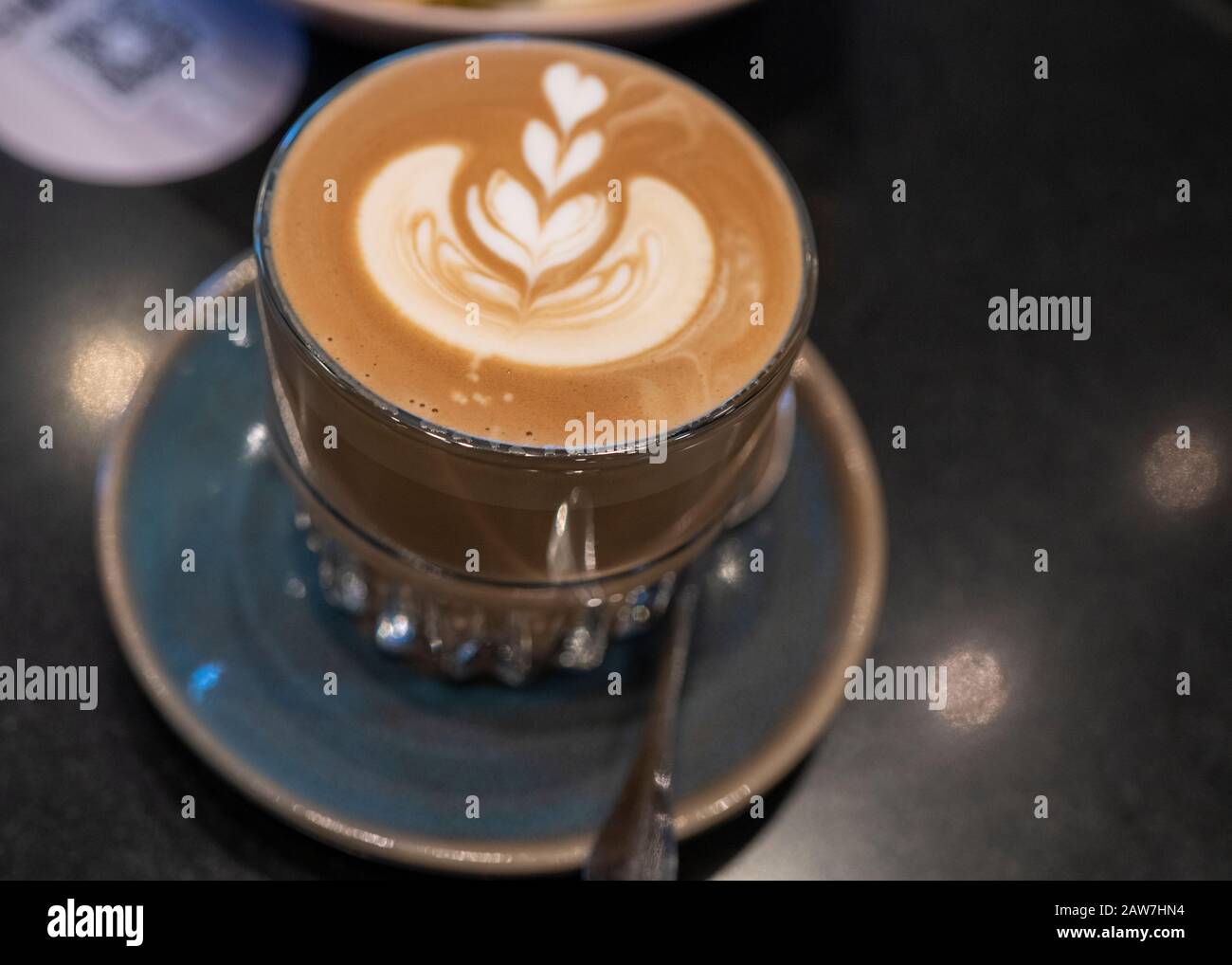 A tasty cup of coffee with latte art Stock Photo - Alamy