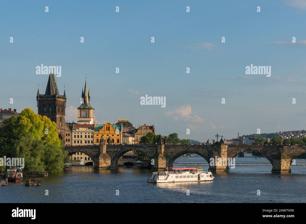 Cruise ship on Vltava river with view of Karluv most, Charles Bridge ...