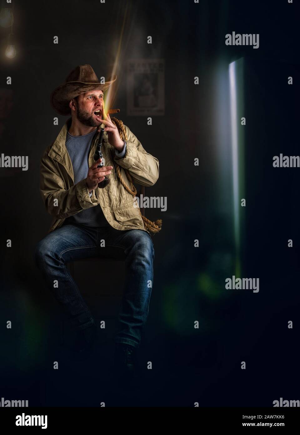 Comic picture. Drunk cowboy in a wide-brimmed hat shoots air from a ...