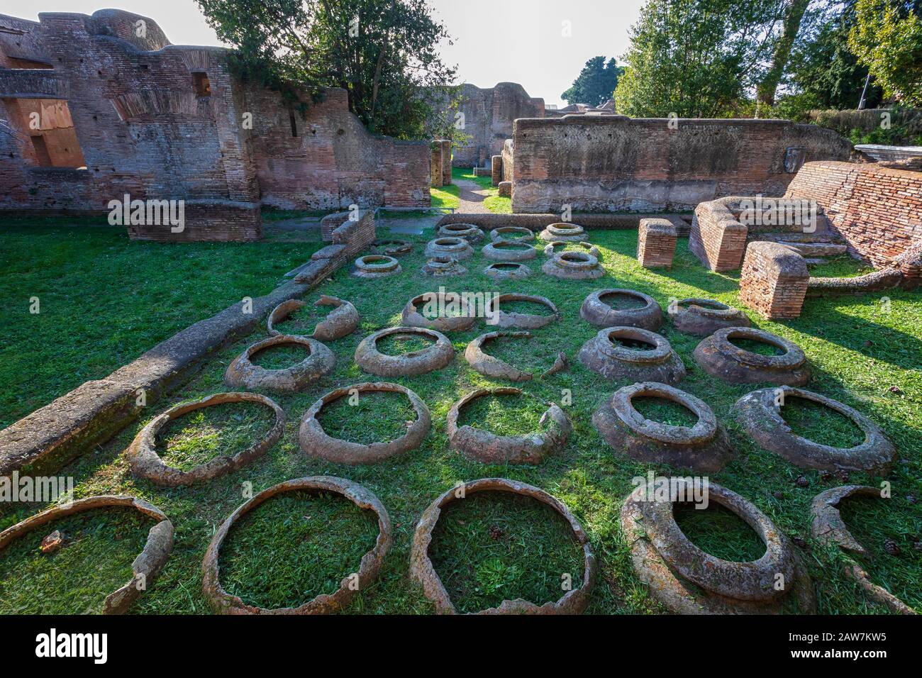 Rome, Italy - February 02, 2020: Ancient amphorae buried in the ruins ...