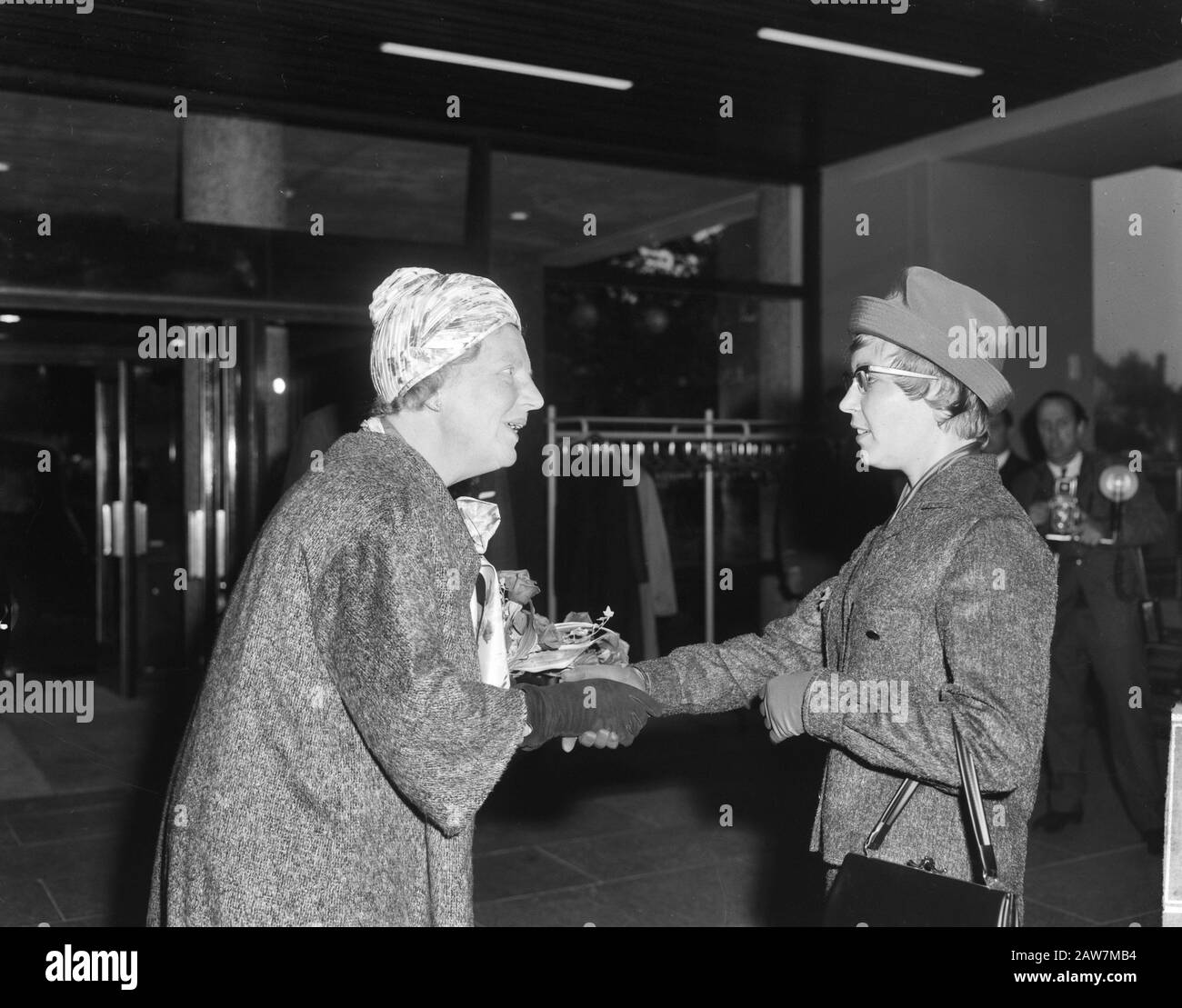 Queen Juliana spent visiting Eindhoven. Her Majesty with Mayor ir White ...