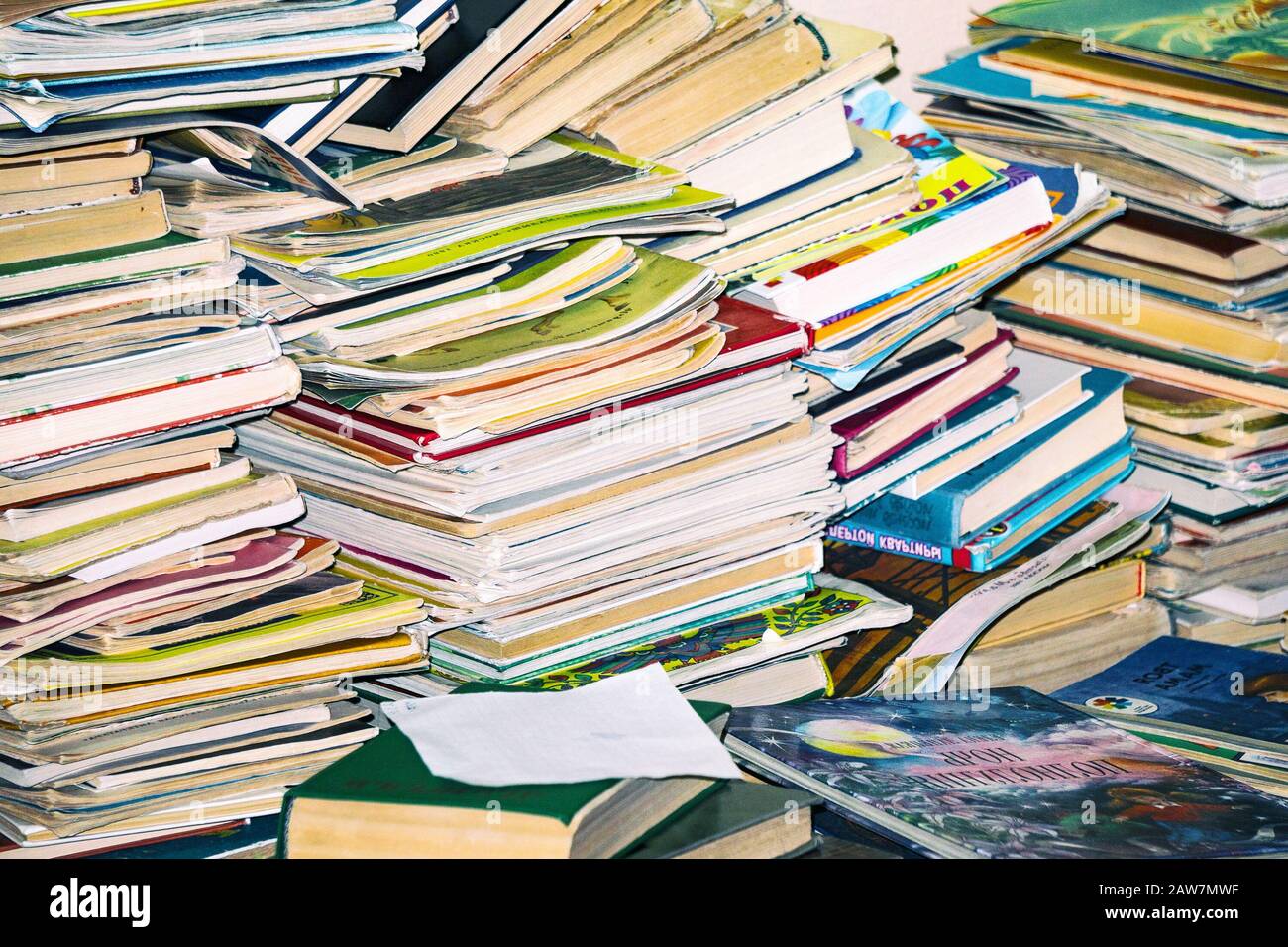 Samara, Russia - January 30, 2018: Old books stacked in piles. Waste ...