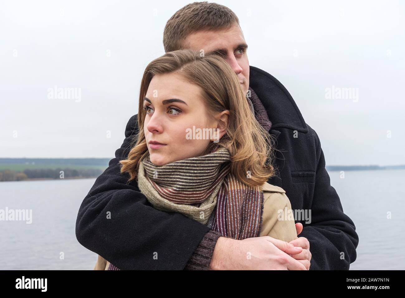 Embrace young man woman hi-res stock photography and images - Alamy