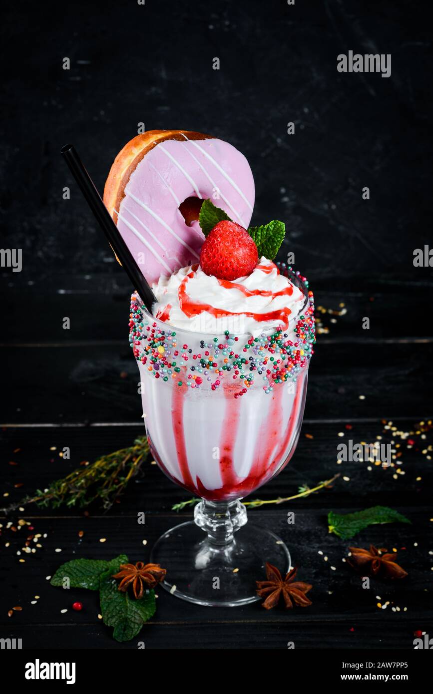 Milk shake with Donat. Top view. Free space for your text. Rustic style ...