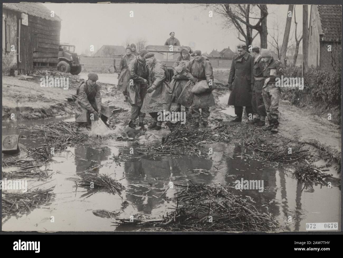 rain, floods, repairs, soldiers Date: February 2, 1953 Location ...
