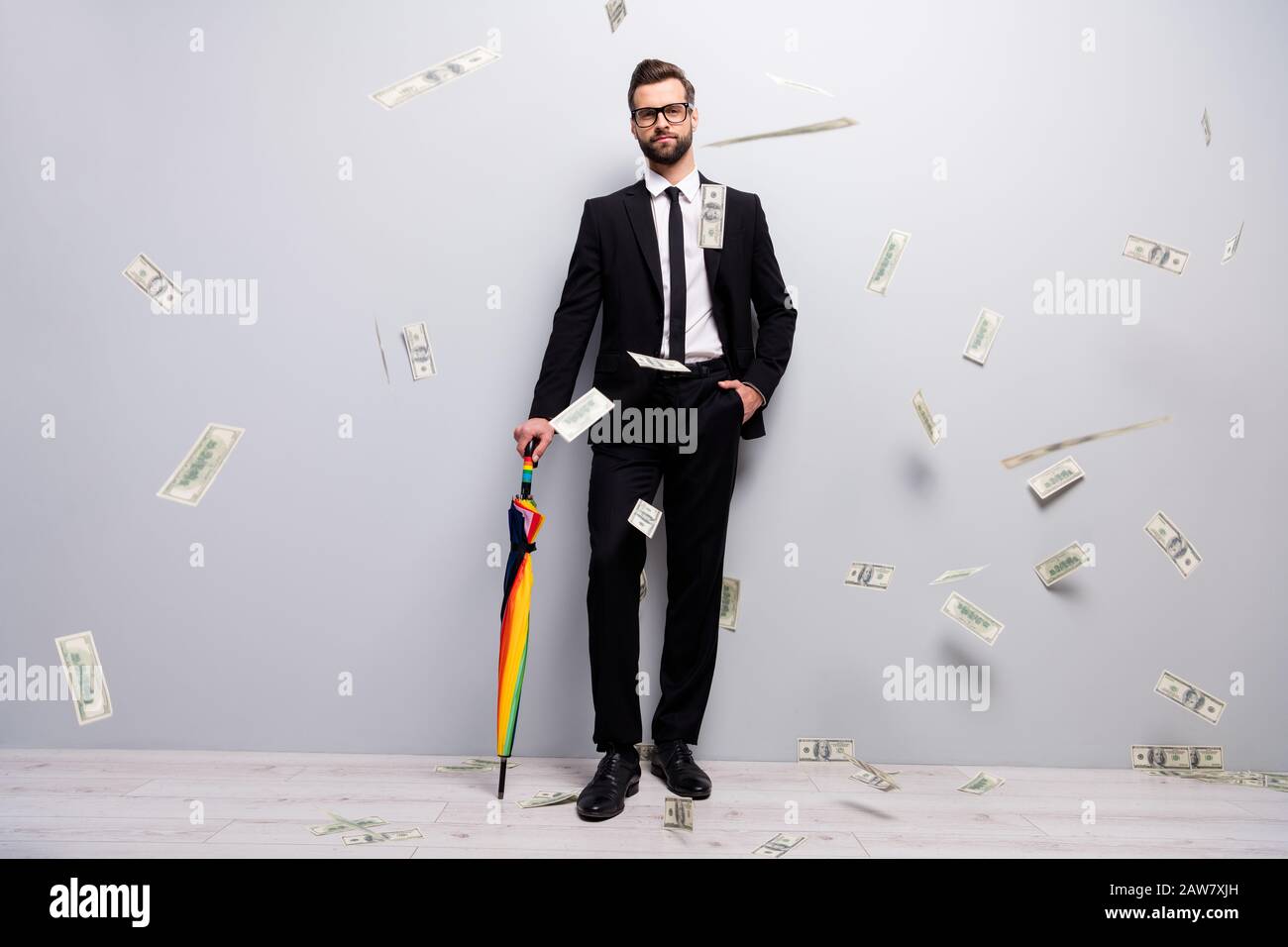 Full size photo confident financier man hold colorful parasol rainstorm ...