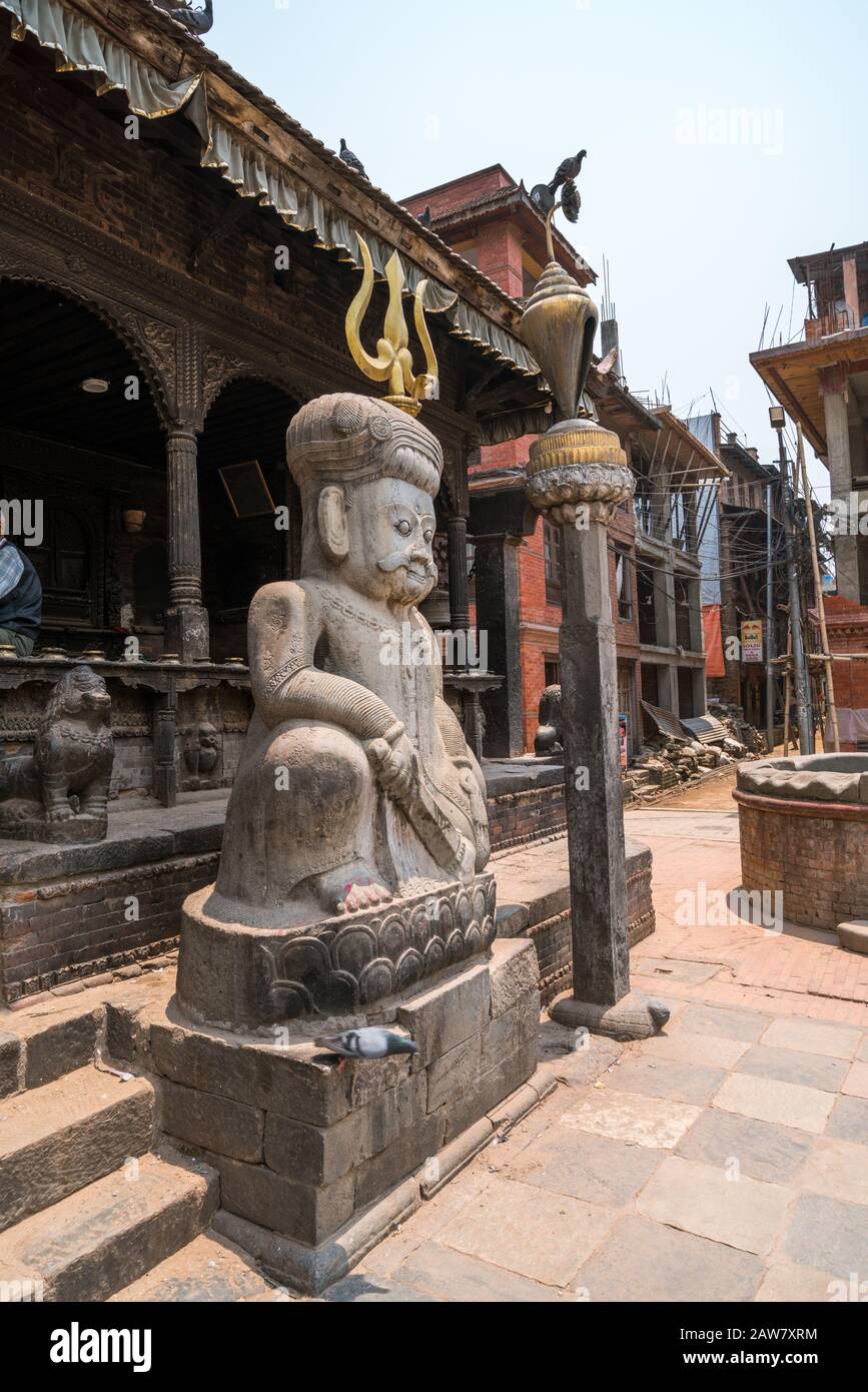 Statue of Malla wrestler at the entrance of Dattatreya temple in ...