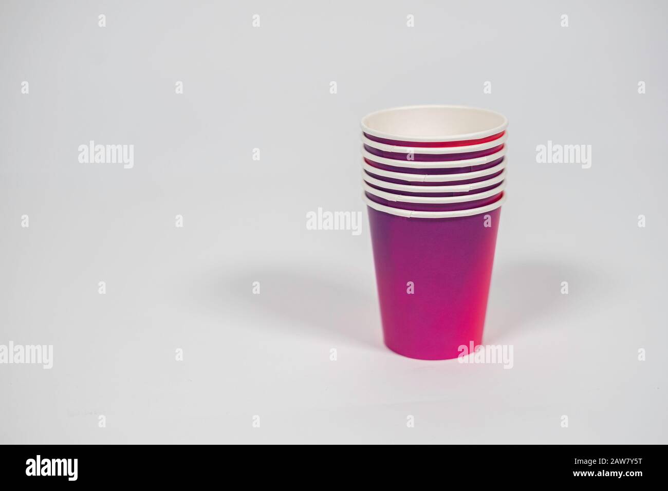 Paper cups isolated on white. Pink disposal coffee cups Stock Photo - Alamy