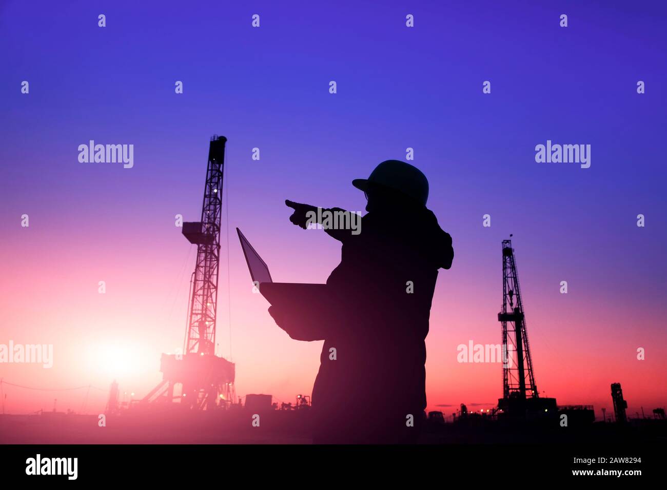 oil field, the oil workers are working Stock Photo - Alamy