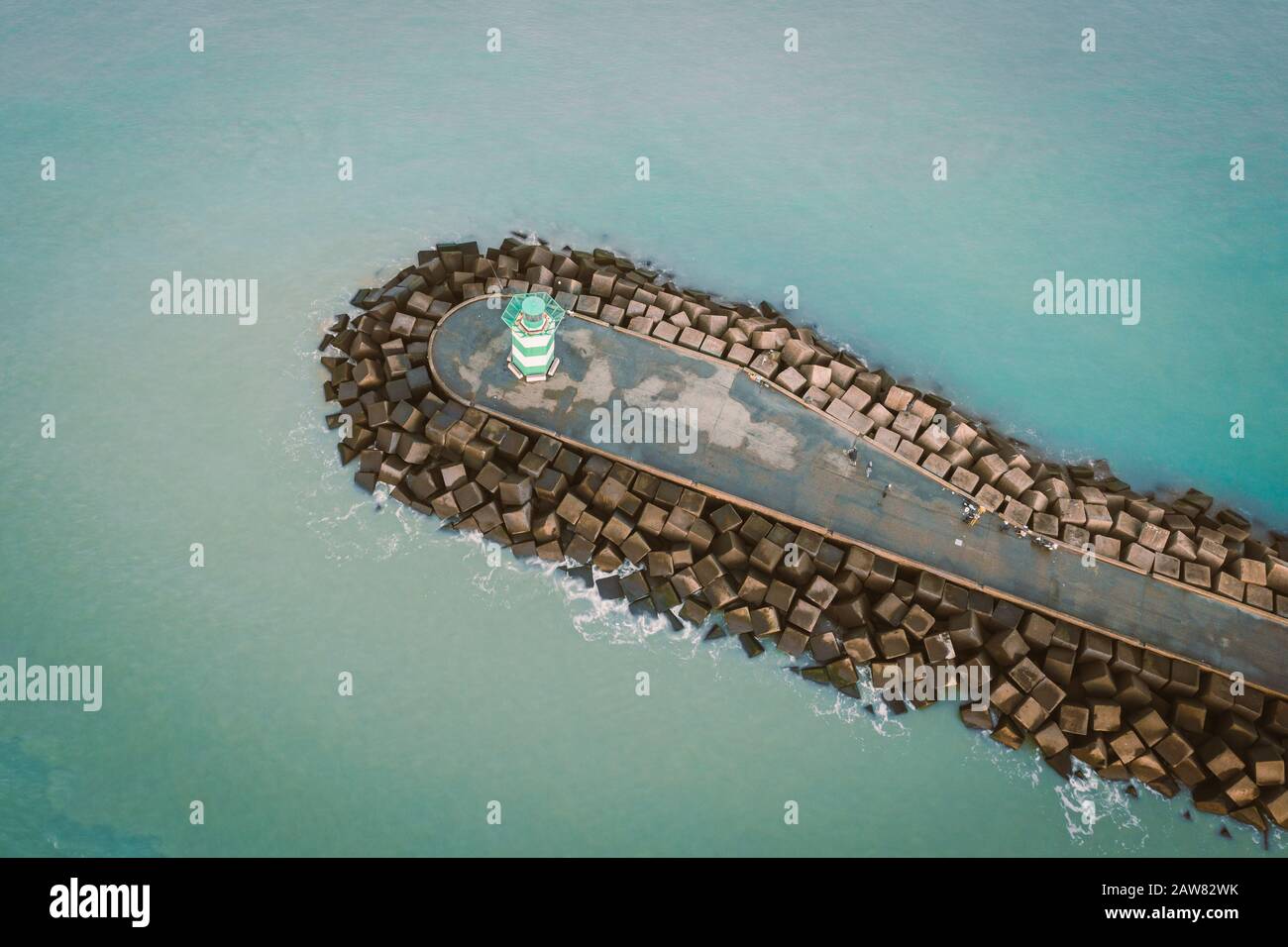 Aerial view of one pier and lighthouse in harbour of Scheveningen, The ...