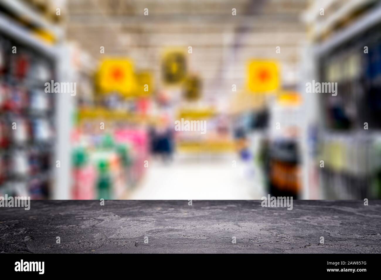 Black stone surface on blurry background in supermarket. Mock up for ...