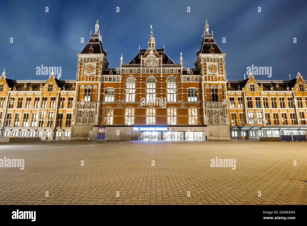 Amsterdam central station long exposure of the front facade of the ...