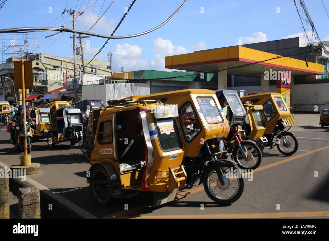 Tricycles/Taxis for hire in The Philippines Stock Photo - Alamy